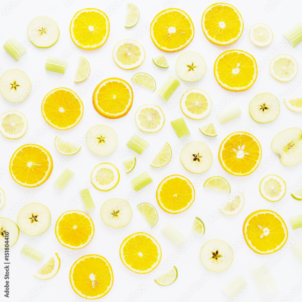 Fresh fruit in a cut on a white background. Pattern of citrus fruits ...