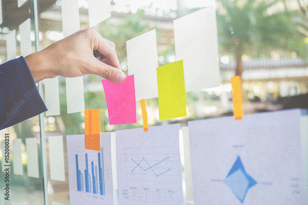 Note paper reminder schedule board. Business people meeting and use ...