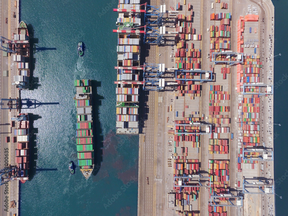 Commercial port with container ships - Top down aerial view. Stock ...