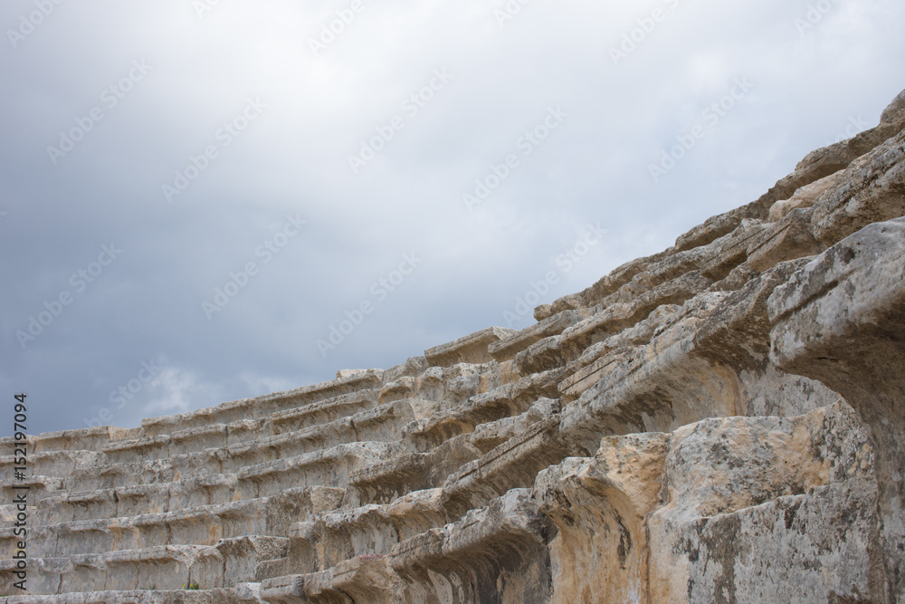 Close up of ancient carved stone steps of Roman theater in Jerash ...