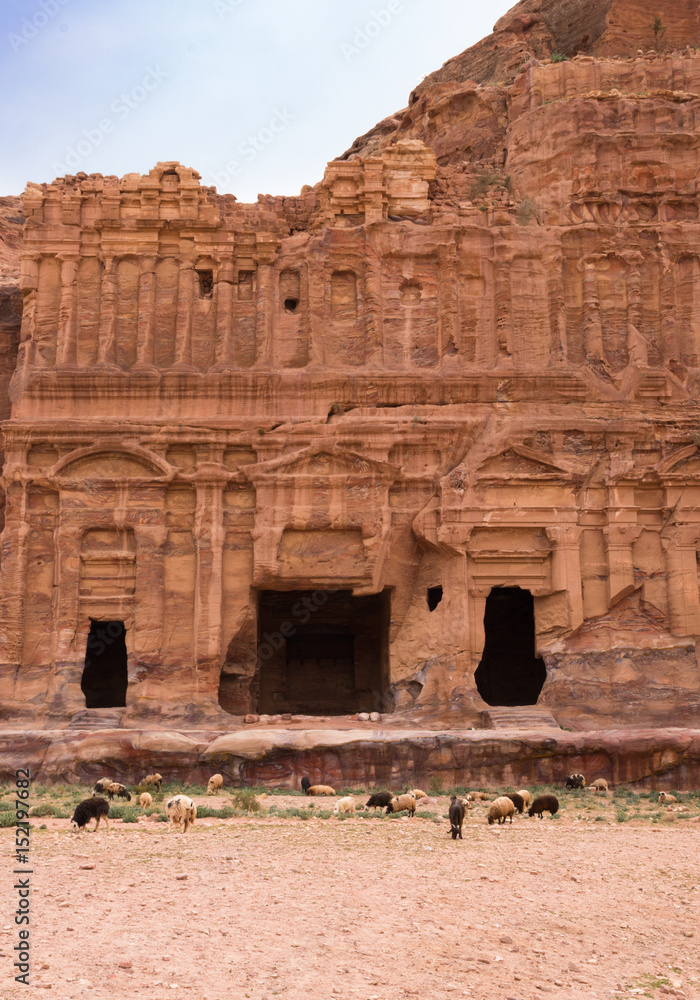 The ornately carved sandstone facade surrounding the entrance of the ...