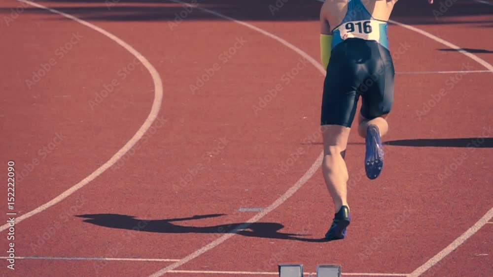 Athlete starts sprint in slow motion Stock-Video | Adobe Stock