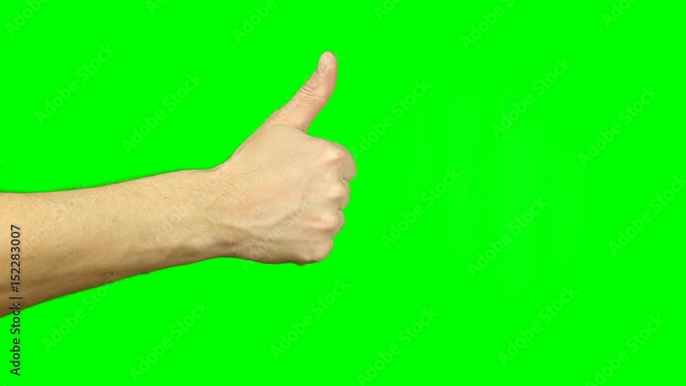 Thumbs up sign hand gesture on green screen. Simbol of approval like ...