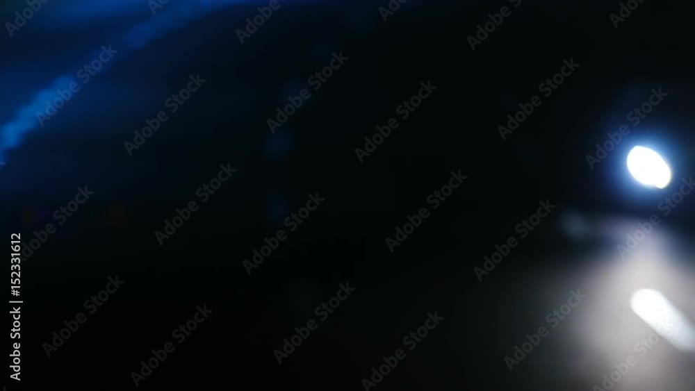 Night view. Cars with lights on at the turn of the road. City ...