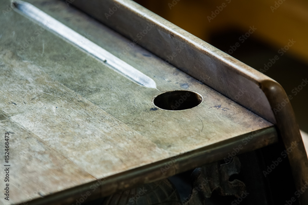 Old vintage school desk with ink well. Stock Photo | Adobe Stock
