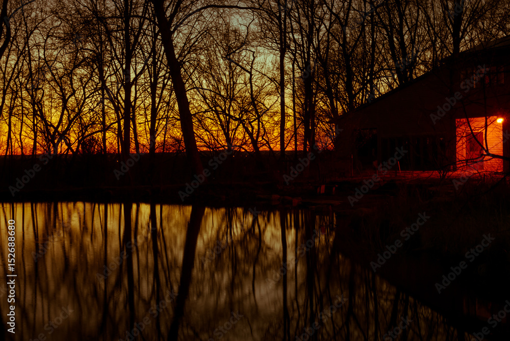 Sunset in moody dark forest. Colorful sky background in nature. Pond lake river reflection of ...