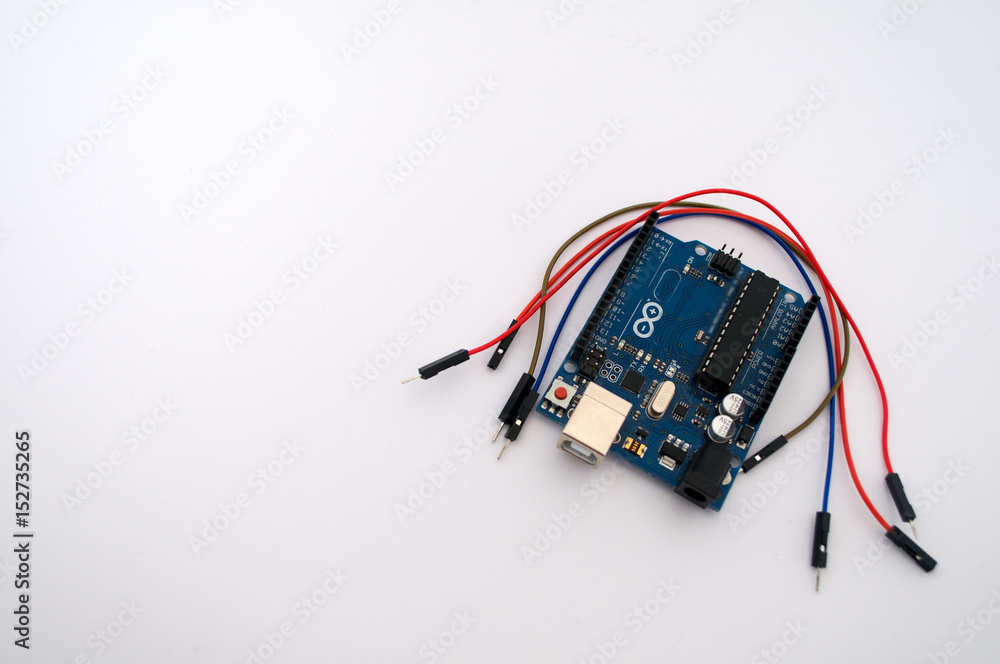 Arduino and around listed wire on a white background Stock Photo ...