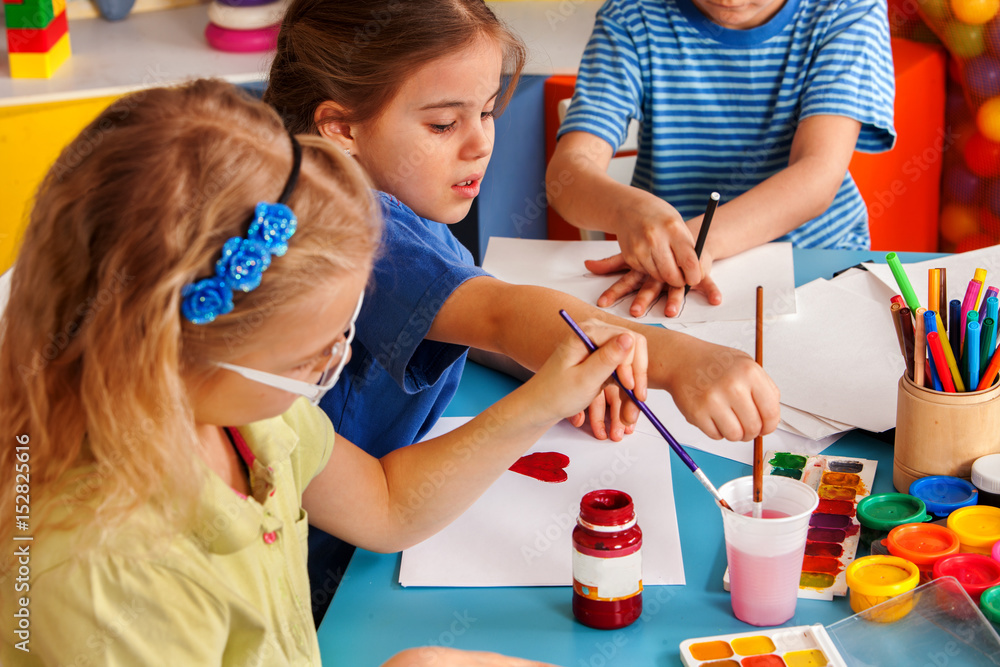 Small students girls painting in art school class. Children boy and ...