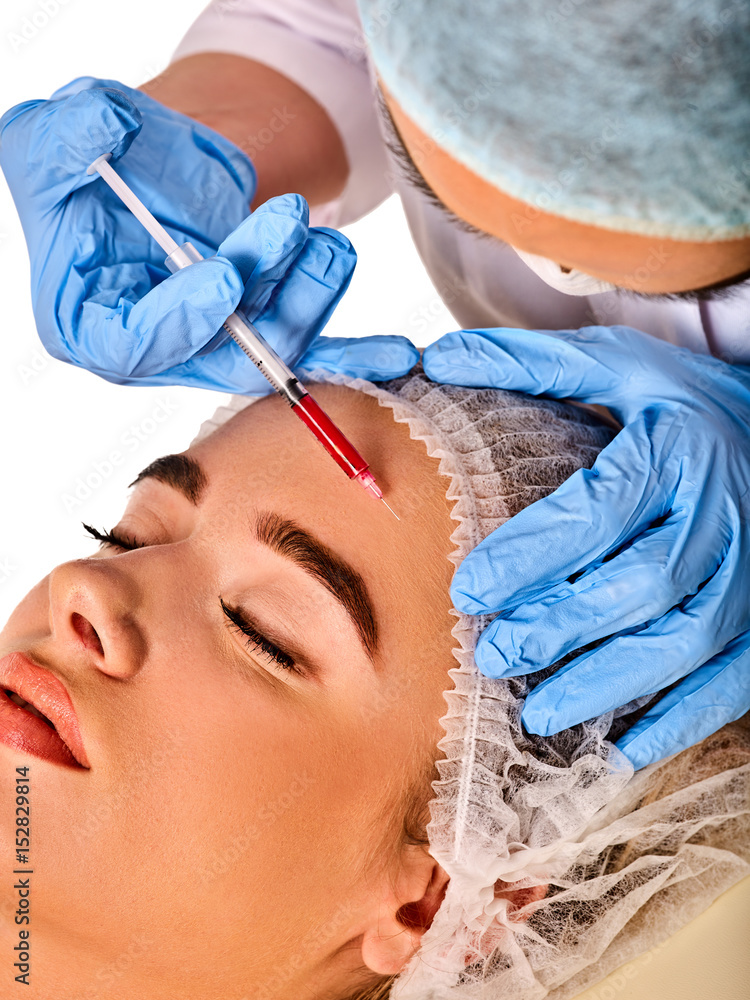 Filler injection for female forehead face. Plastic aesthetic facial ...