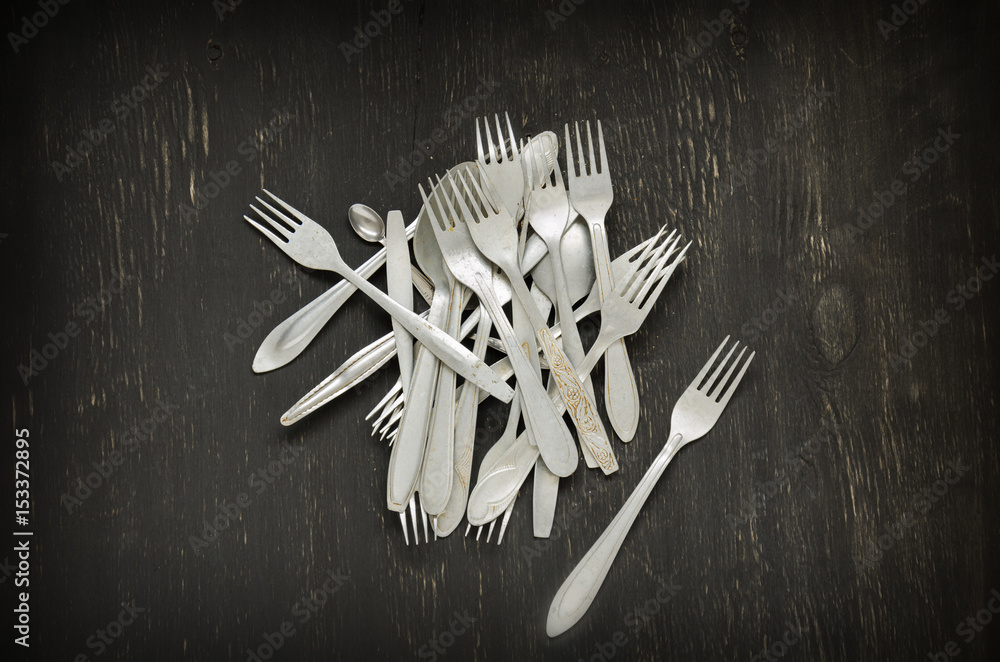Dirty rustic forks and spoons Stock-Foto | Adobe Stock