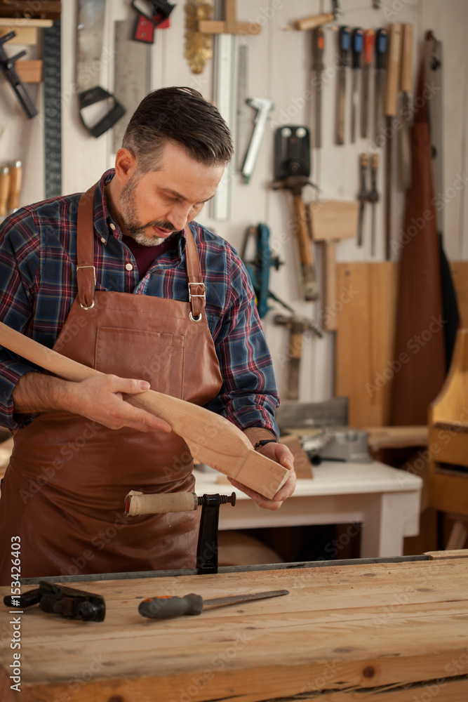 Carpenter Examining Cabrioli Table (or Chair) Legs/Middle aged handsome ...