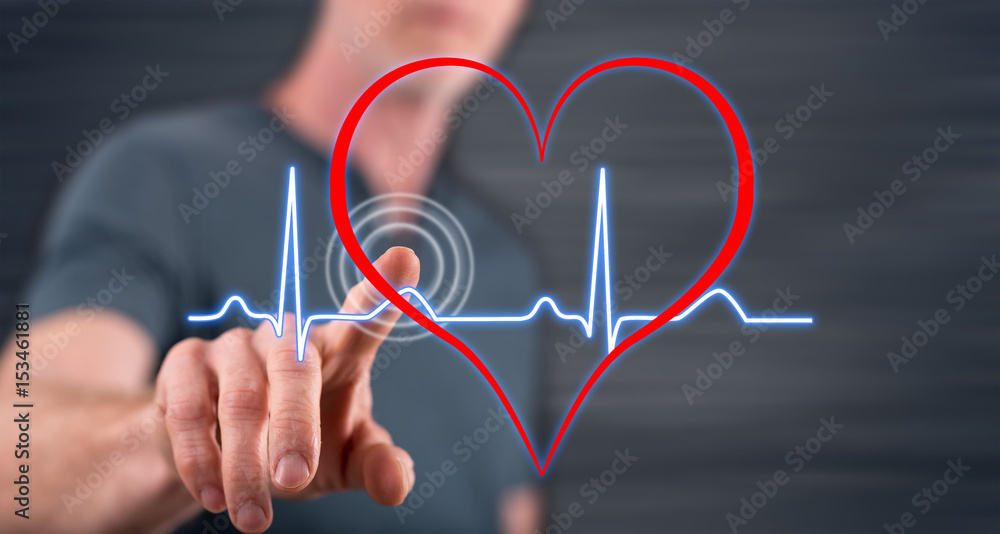 Man touching a heart beats graph on a touch screen Stock Photo | Adobe ...