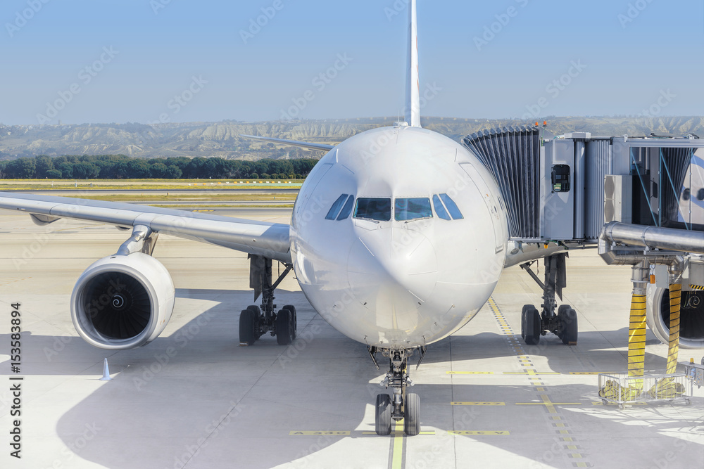 Airplane ready for boarding in a airport hub. Airplane ready for push ...