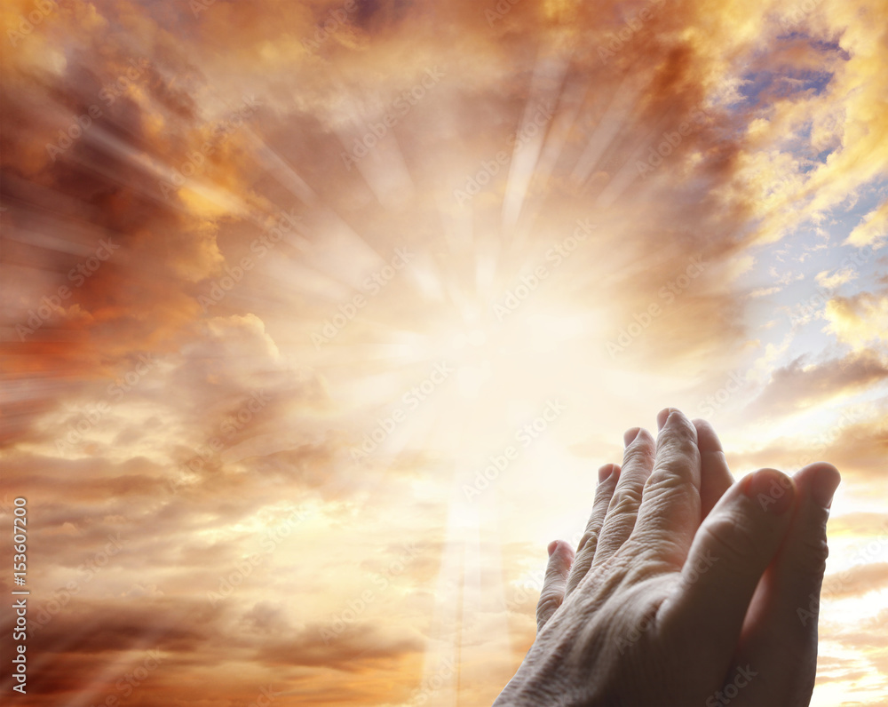 Prayer hands in sky Stock Photo | Adobe Stock