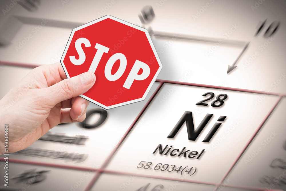 Stop heavy metals - Concept image with hand holding a stop sign against ...