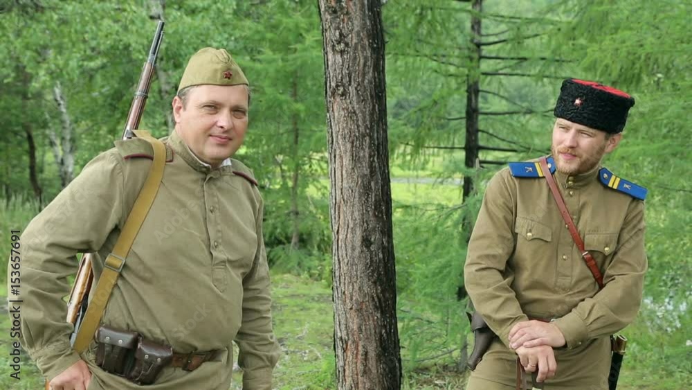 The army of the USSR. Soviet army soldiers are resting. Soldiers listen ...