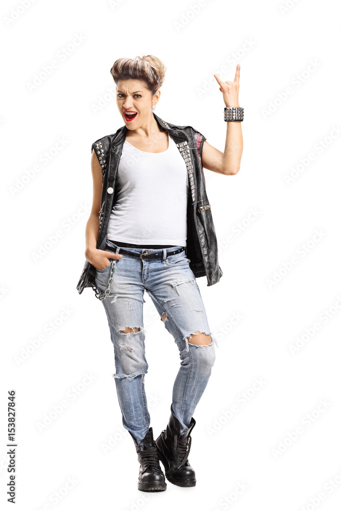 Punk girl making a rock hand gesture Stock Photo | Adobe Stock