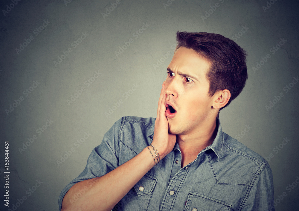 shocked man looking to the side Stock Photo | Adobe Stock