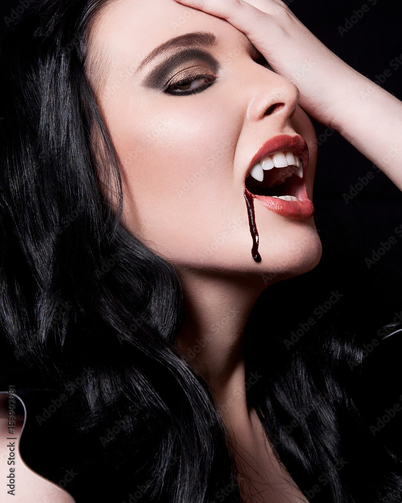 Young female vampire Stock Photo | Adobe Stock