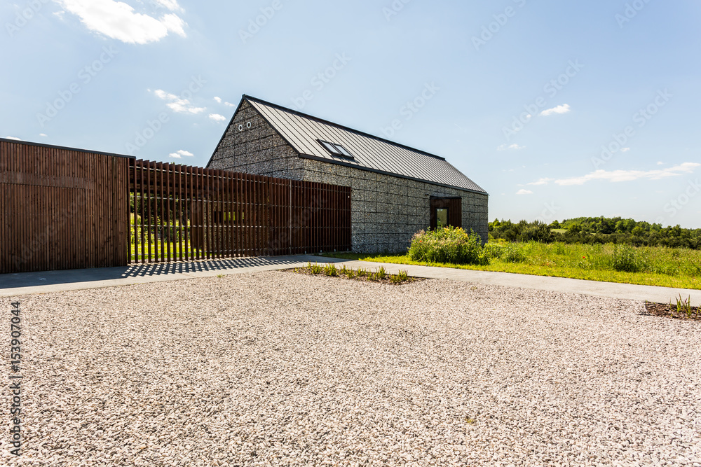 Big modern stone house exterior Stock Photo | Adobe Stock