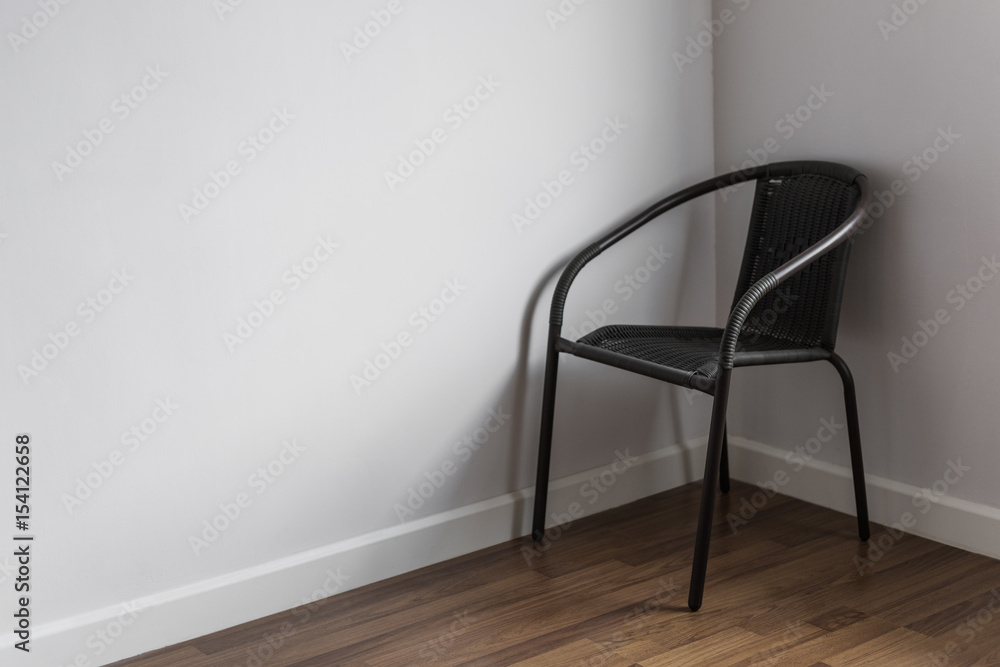 a chair stand alone in the corner of living room Stock Photo | Adobe Stock