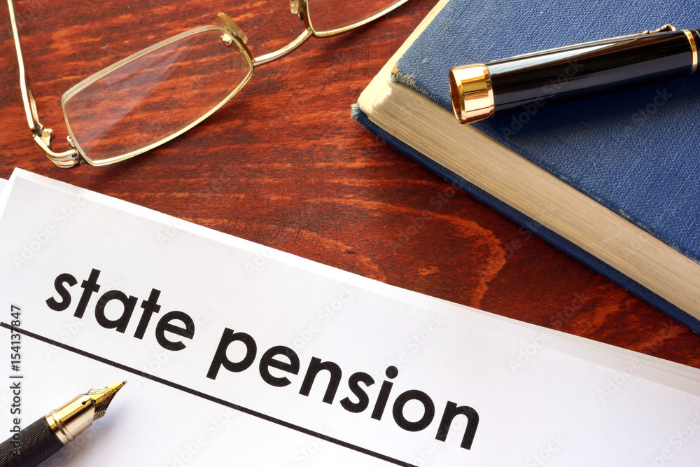 Paper with title state pension on a table. Stock Photo | Adobe Stock
