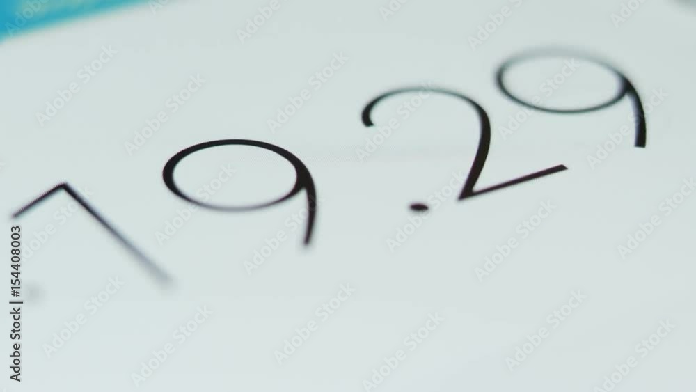 Thin number fonts countdown close up in white background. Digital ...