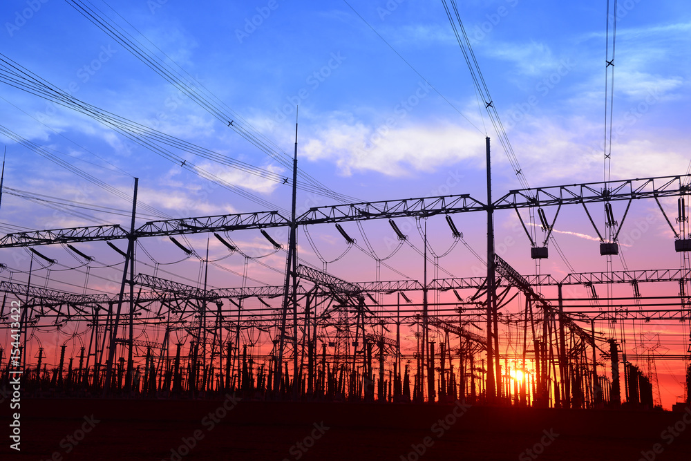 High voltage power grid, in the sunset Stock Photo | Adobe Stock