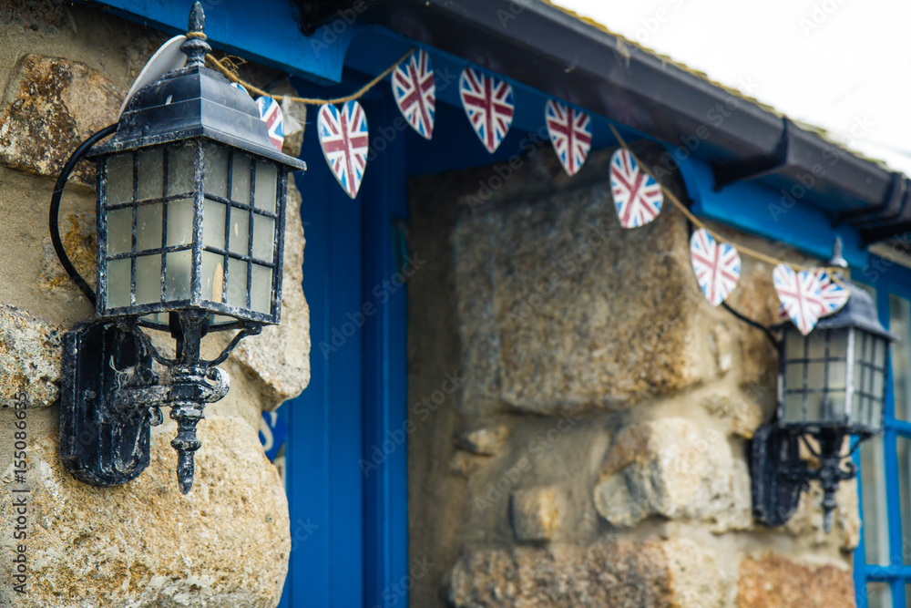 Union Jack flags over house entry in English countryside Stock Photo ...