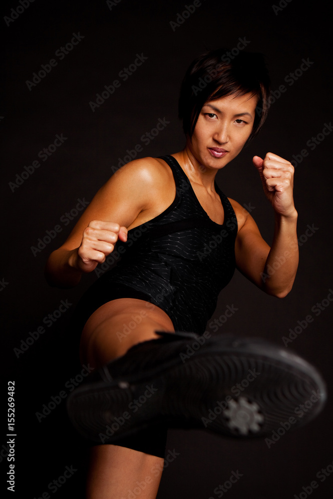 Portrait of woman practicing self defense. Stock-Foto | Adobe Stock