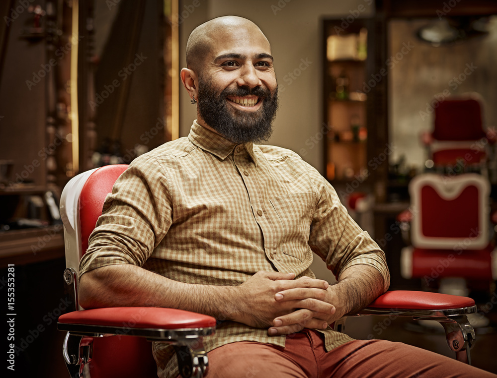 Foto de Portrait of a barber. do Stock | Adobe Stock