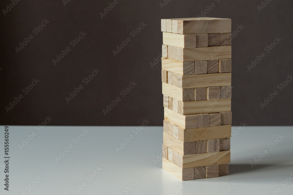 Tower from wooden blocks. Jenga board game Stock Photo | Adobe Stock