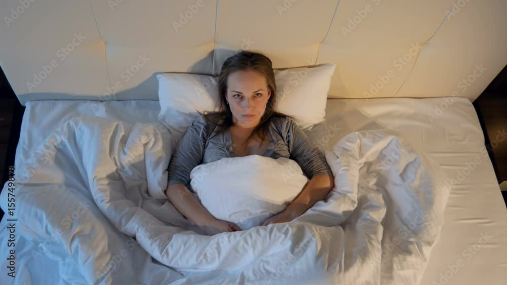 Woman disturbed by the noise. Close-up. 4K. Stock Video | Adobe Stock