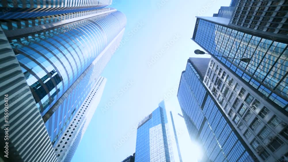 Smooth low angle tracking shot of office buildings. Low angle office ...