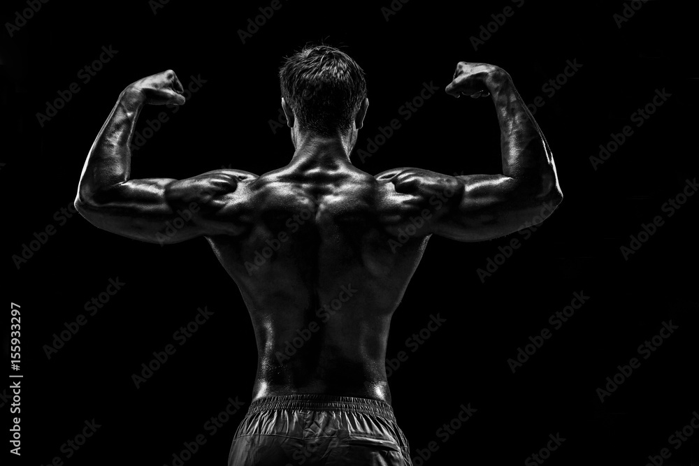 Strong Athletic Man Fitness Model posing back muscles, triceps o Stock ...