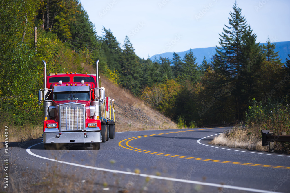 Red big rig Semi Truck with trailer winding road Stock Photo | Adobe Stock