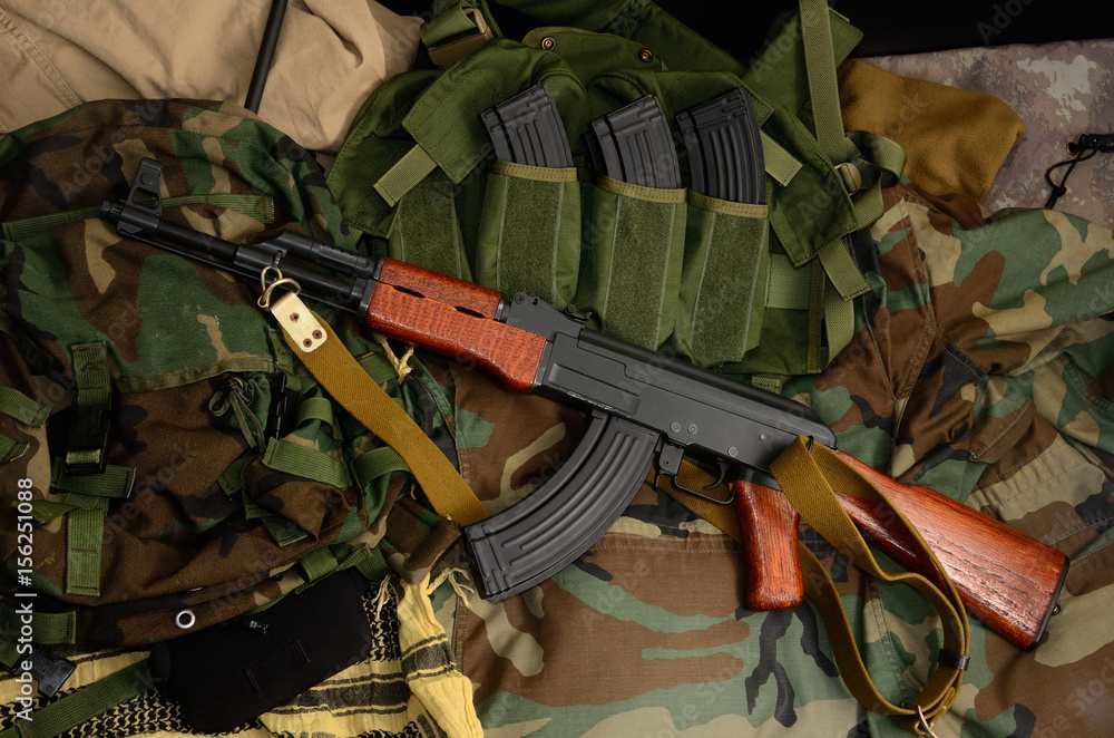 Terrorist Weapons with tactical chest rigs and backpack. Stock Photo ...