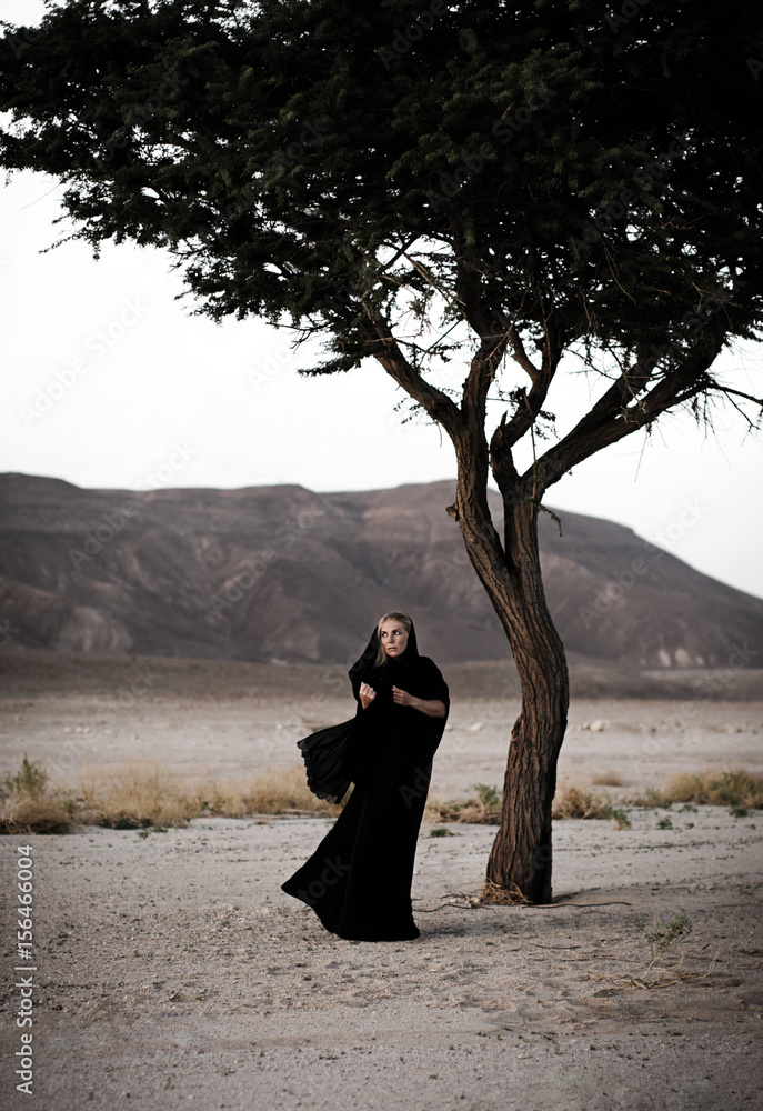 Woman face with deep eyes and long hair on wind portrait, photo session ...