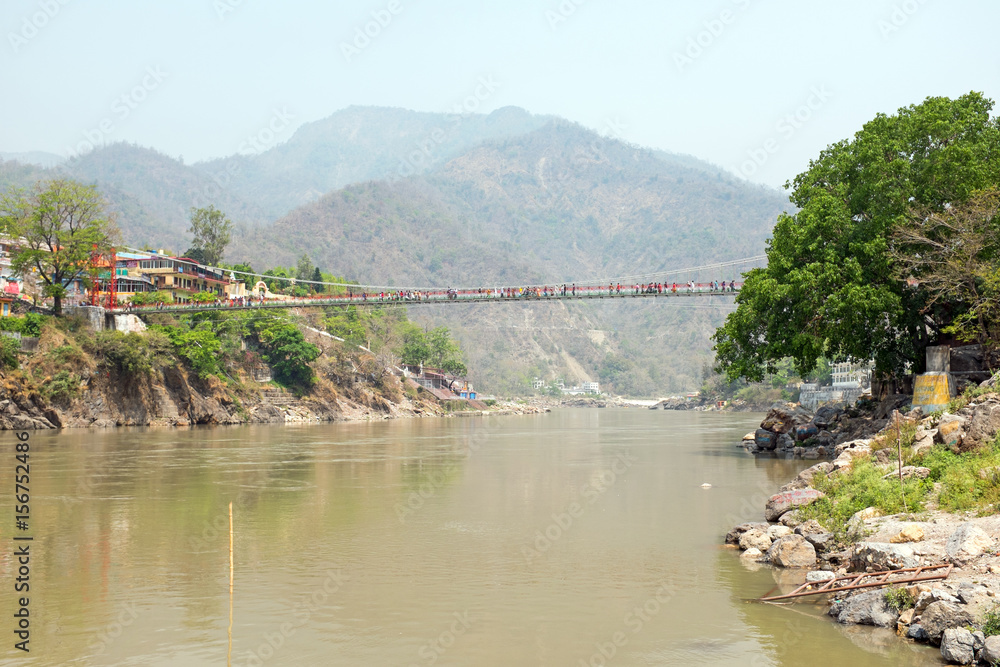 The suspension bridge at Laxman Jhula in India Stock Photo | Adobe Stock