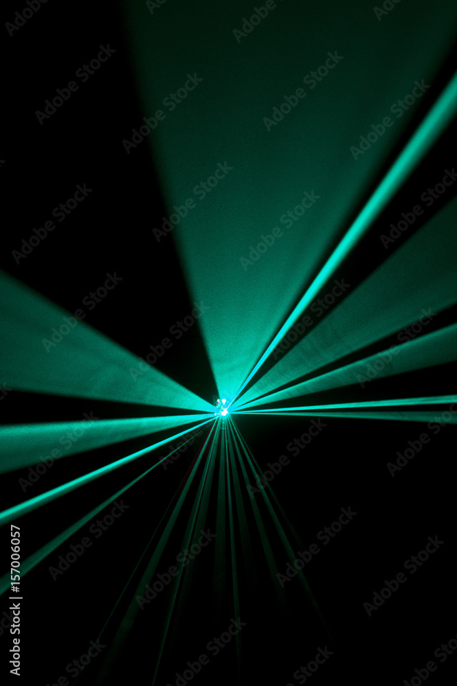 Laser beam light blue on a black background Stock-Foto | Adobe Stock