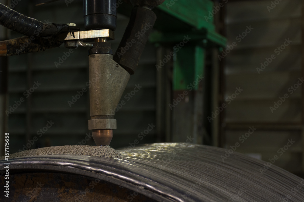 Overlay welding hard surfacing of steel roll by submerge arc welding ...