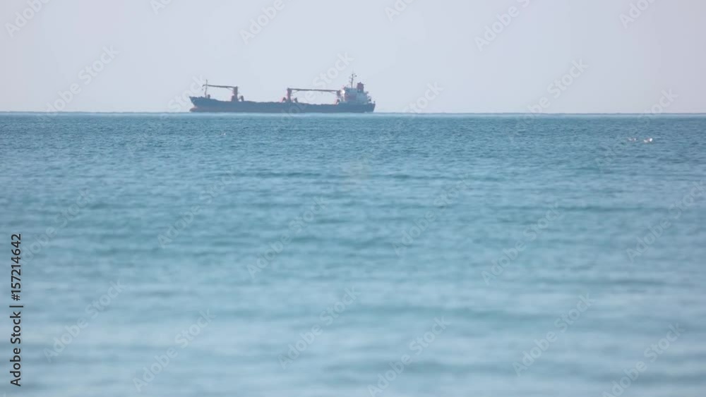 Cargo transportation by sea. Large loaded barge. Nice view of the sea ...
