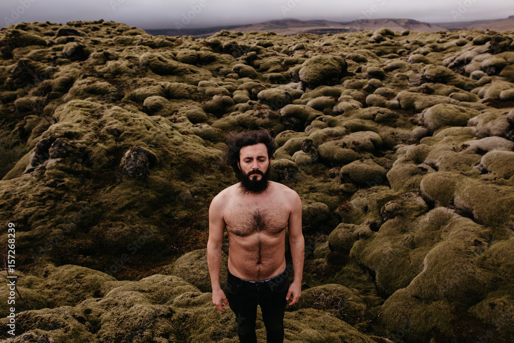 Shirtless muscular bearded man in Icelandic nature Stock Photo | Adobe Stock