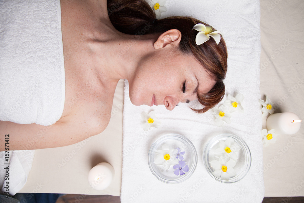the beautiful girl lying in Spa massage sauna Stock Photo | Adobe Stock