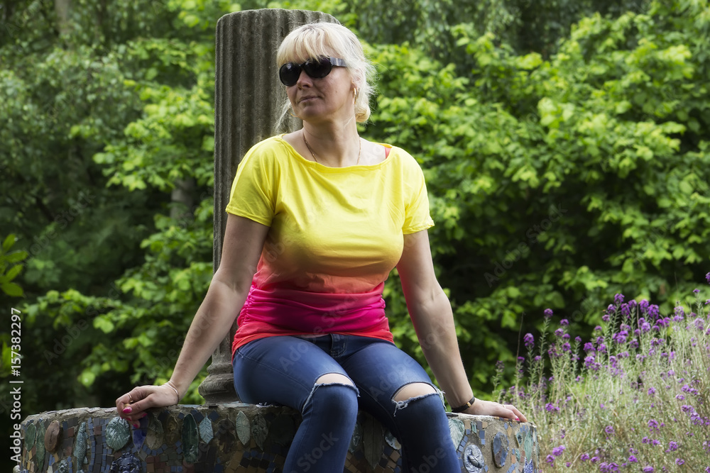 45 years old beautiful woman posing in nature Stock Photo | Adobe Stock