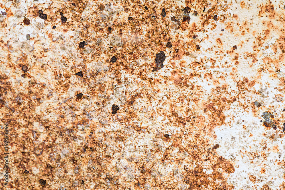Severely corroded metal under the swollen enamel Stock Photo | Adobe Stock