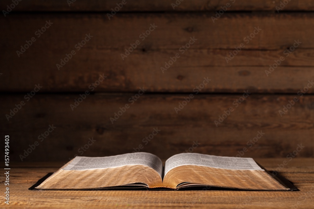 Open bible on desk. Stock Photo | Adobe Stock