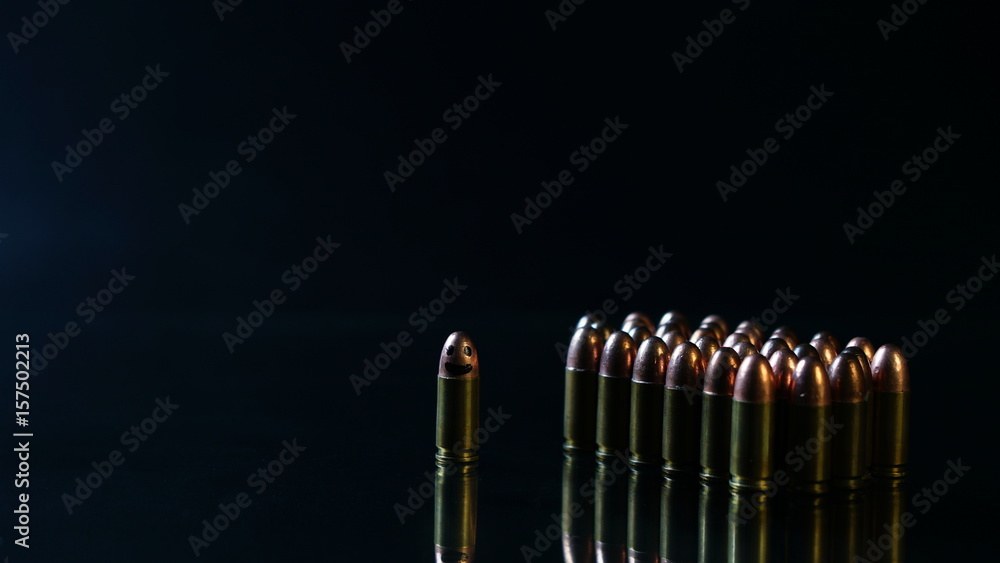 Bullets on the black mirror floor. Bullets are a projectile expelled ...