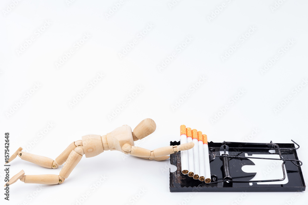 Wooden puppet caught in Mousetrap with cigarettes as bait.No Smoking ...