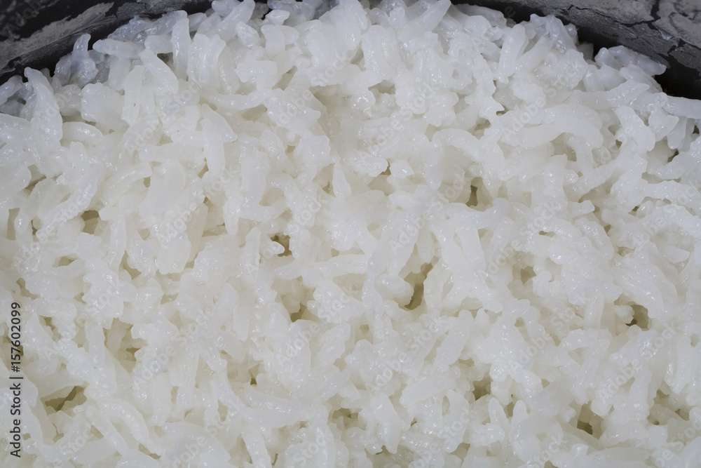 White rice in a pan. Stock Photo | Adobe Stock